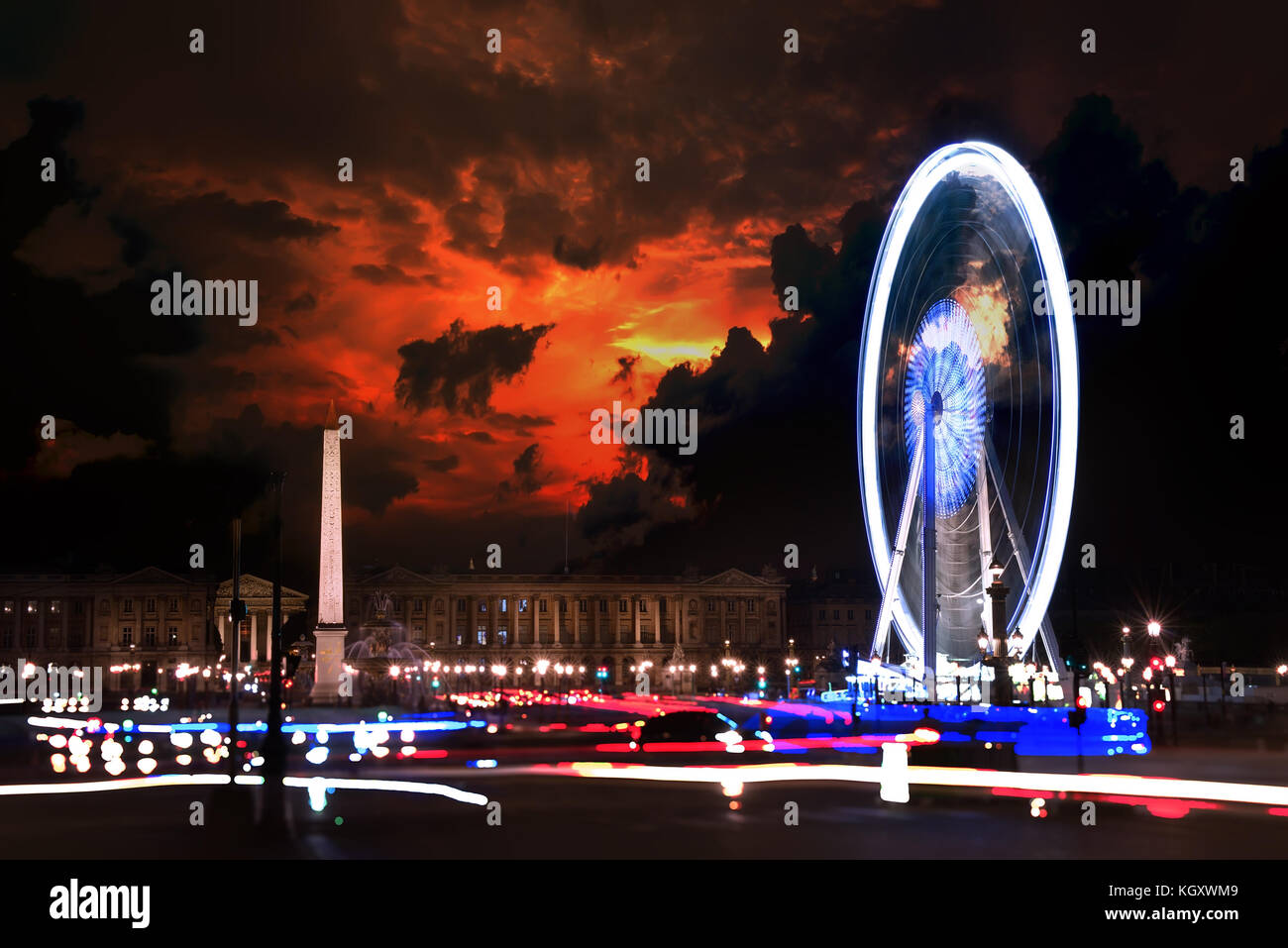 Ferris wheel and unusual red cloudy sky in Paris, France Stock Photo ...