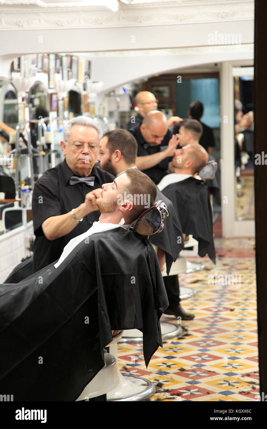Traditional barber shop customer being shaved, El Kinze de Cuchilleros ...