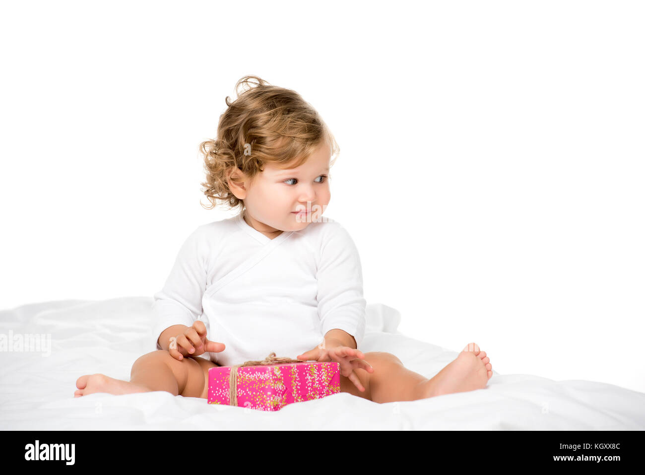 toddler girl with wrapped present Stock Photo - Alamy