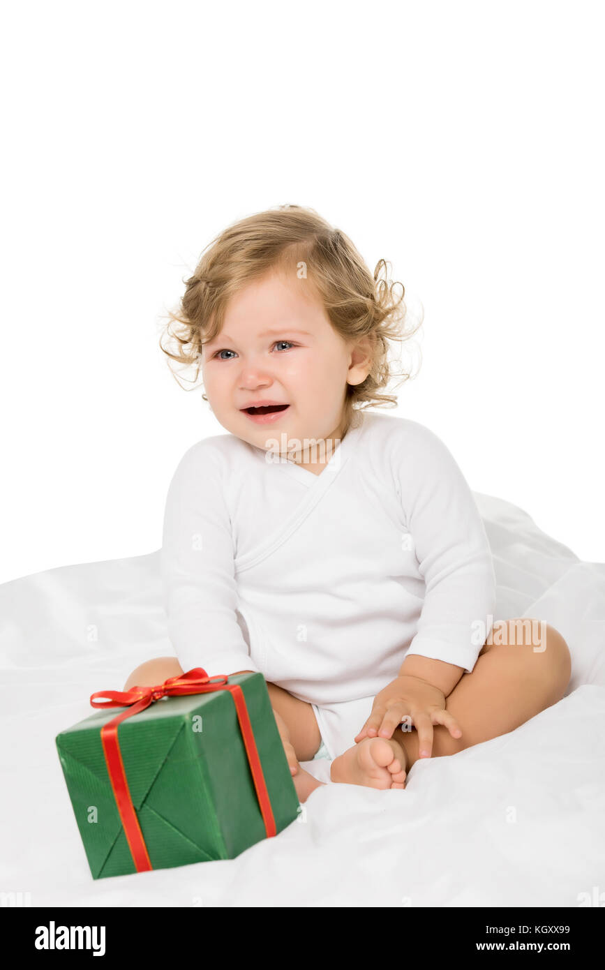 toddler girl with wrapped present Stock Photo - Alamy