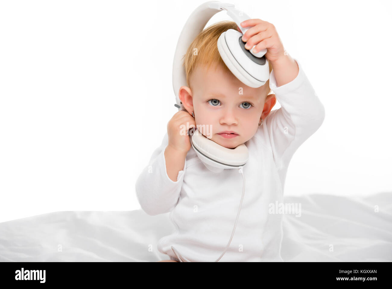 Baby with headphones hi-res stock photography and images - Alamy