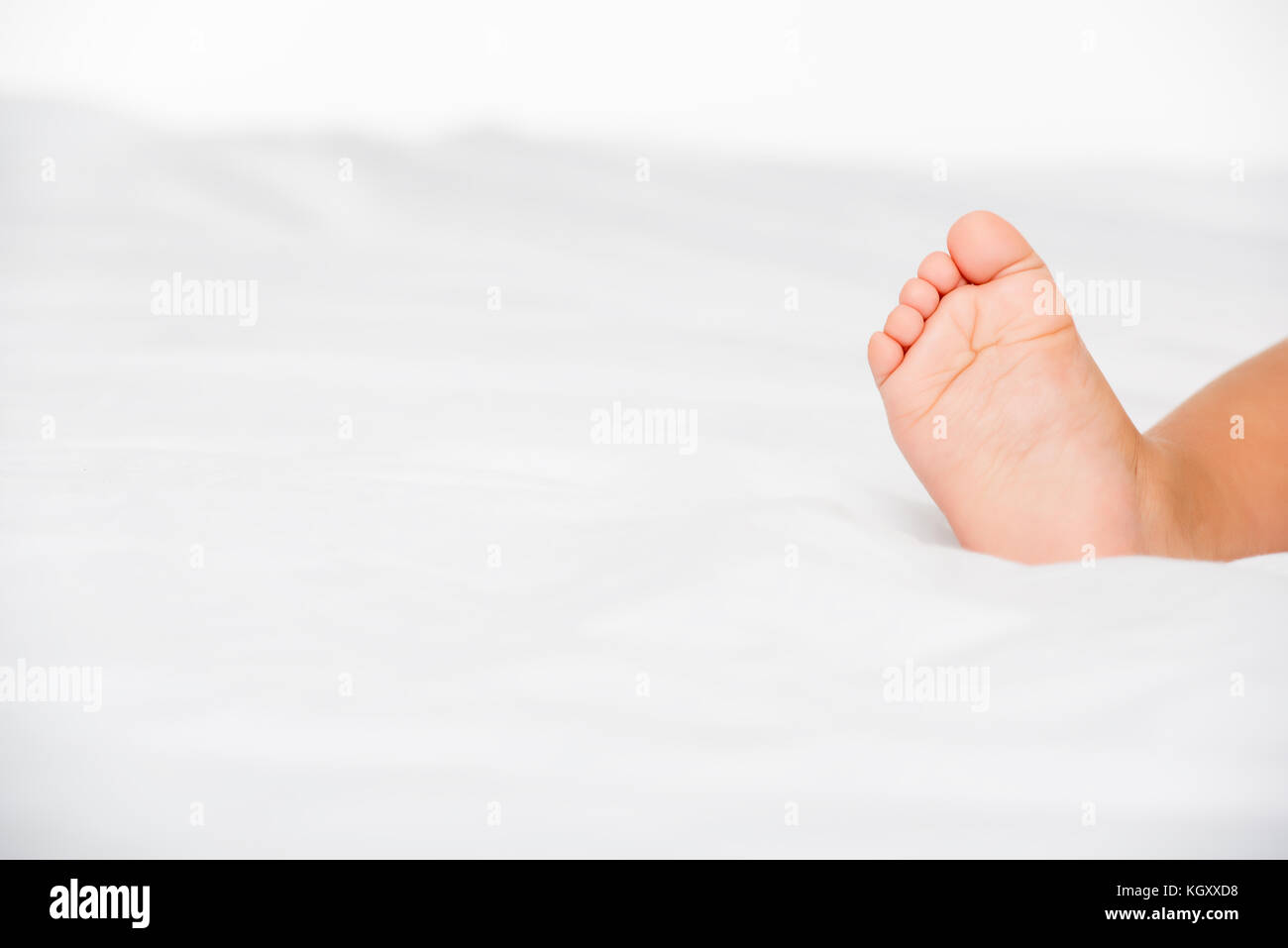 Childcare foot hi-res stock photography and images - Alamy