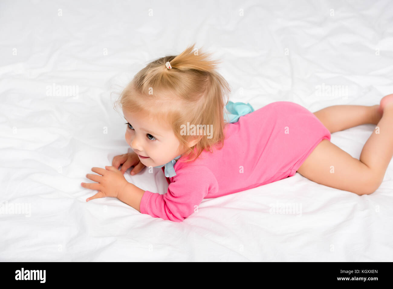 cute baby in bodysuit Stock Photo - Alamy