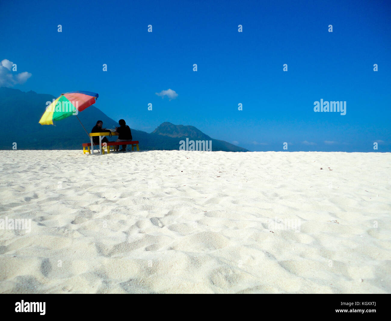 Relaxing on the white sand beach Stock Photo - Alamy