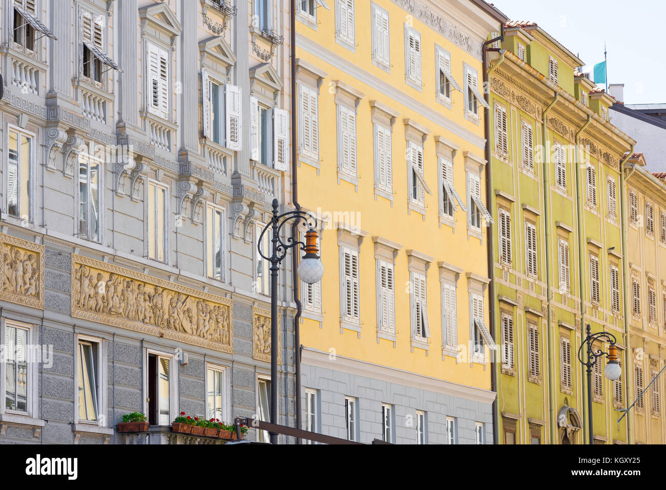 Trieste Italy city, a row of 19th century pastel-coloured neoclassical ...