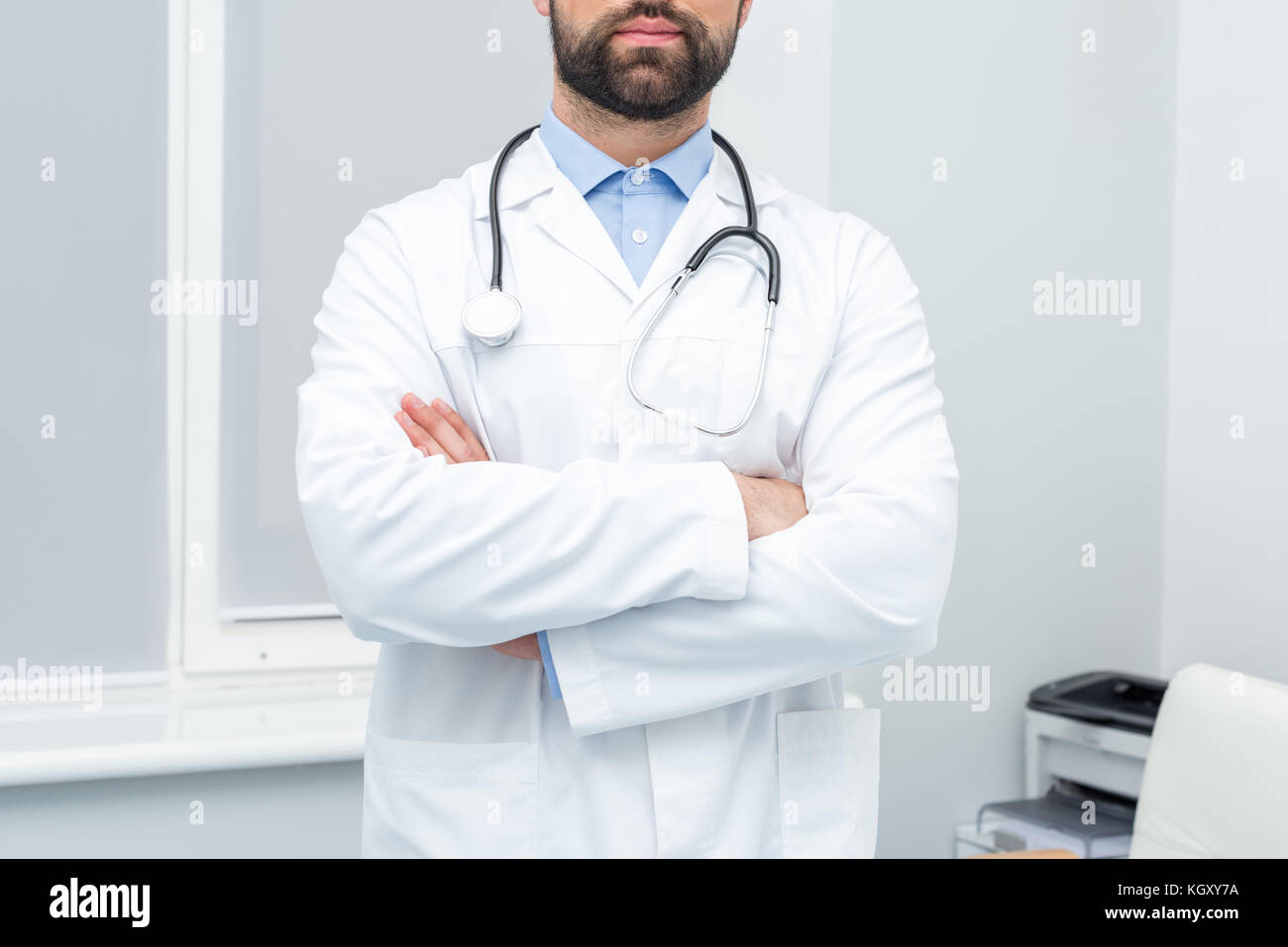 doctor with crossed arms Stock Photo - Alamy