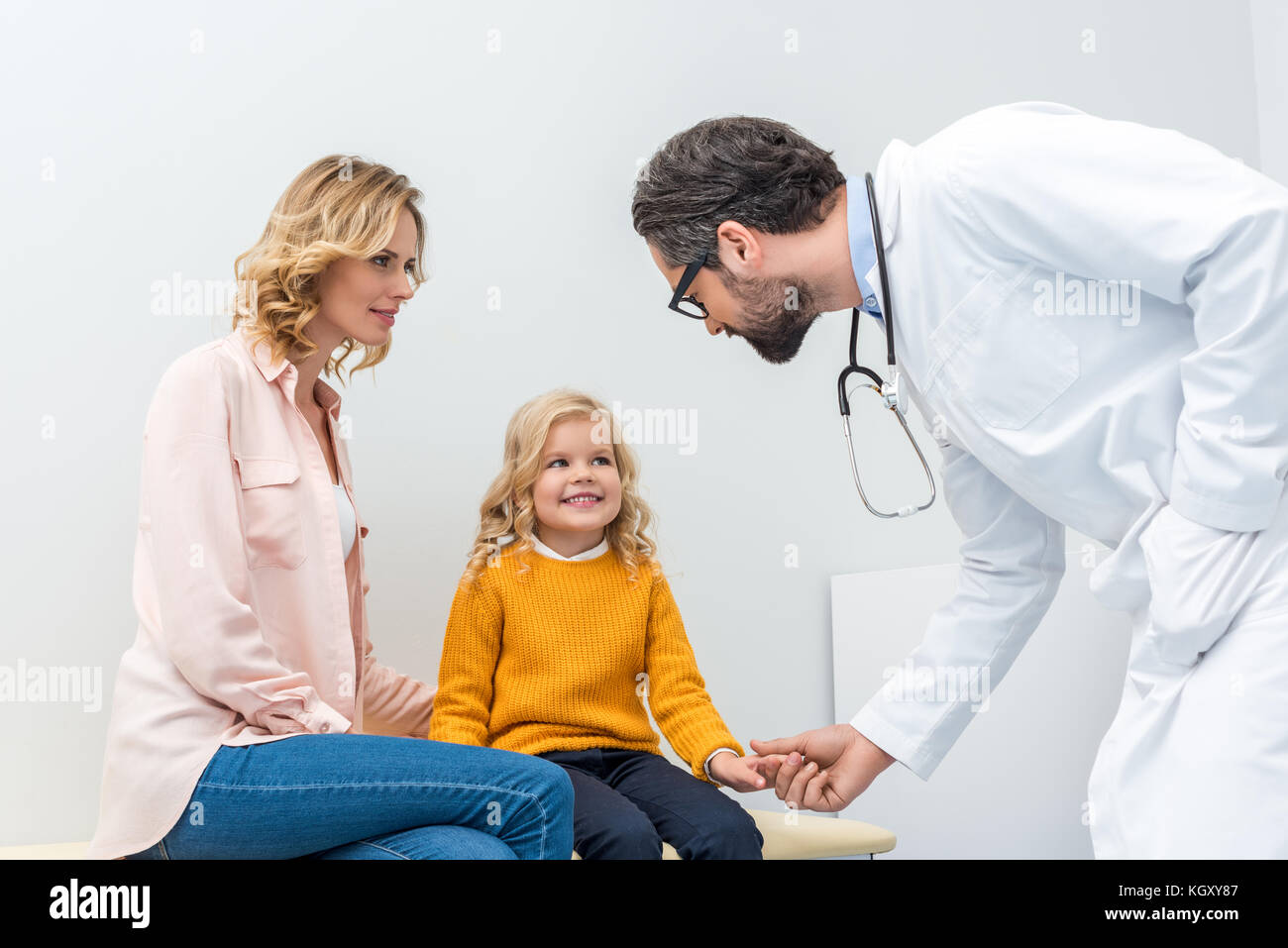 mother and daughter visiting pediatrist Stock Photo - Alamy