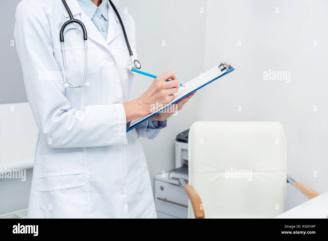 Female healthcare professional writing hi-res stock photography and ...