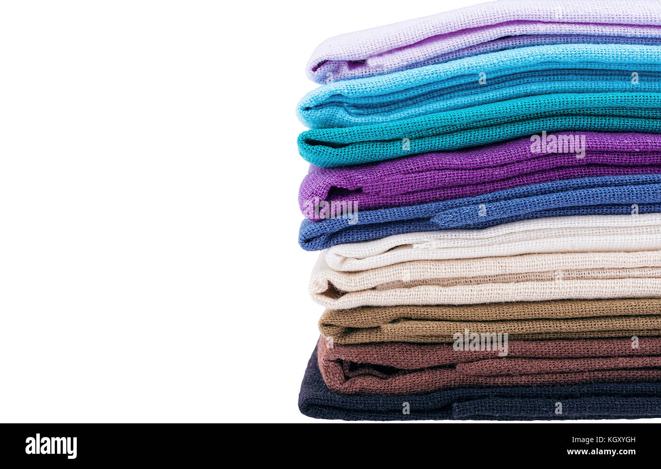 Stack of multicolored linen fabric, side view isolated on white Stock ...