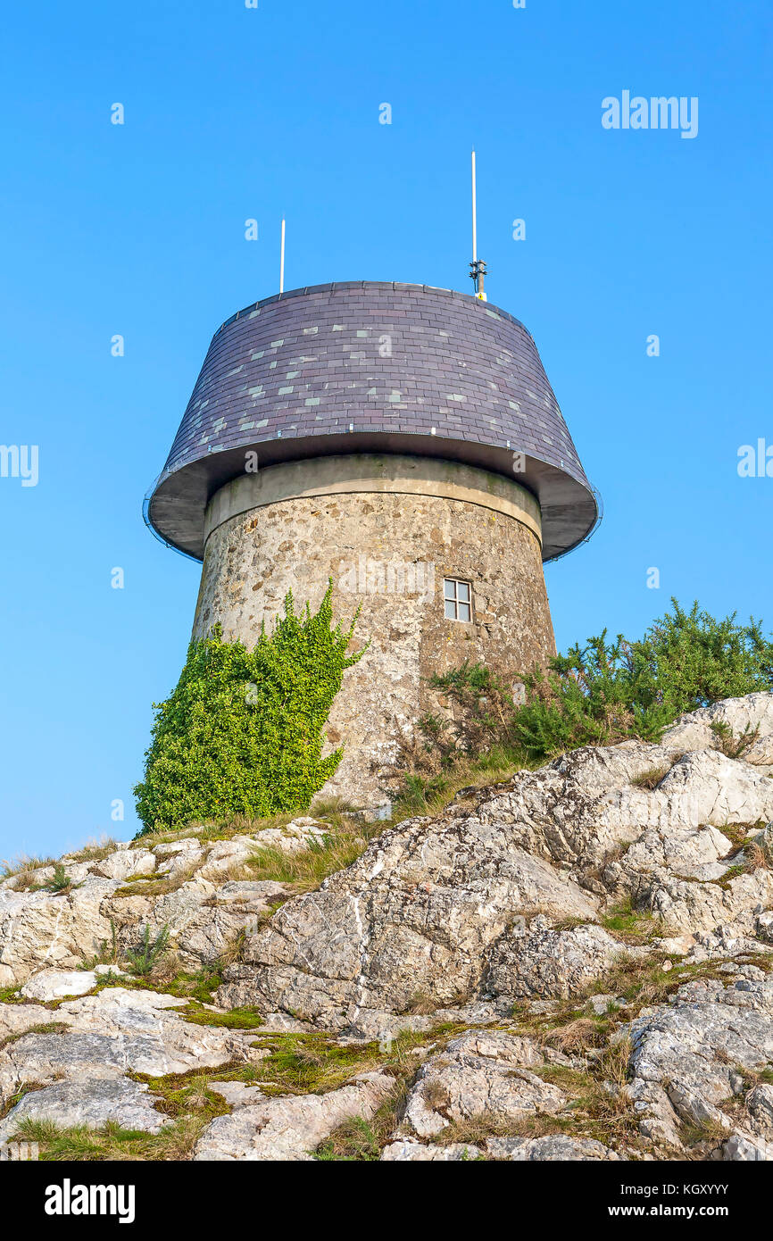 Looking up at Melin Wynt y Craig windmill sitting on a rocky crag at ...
