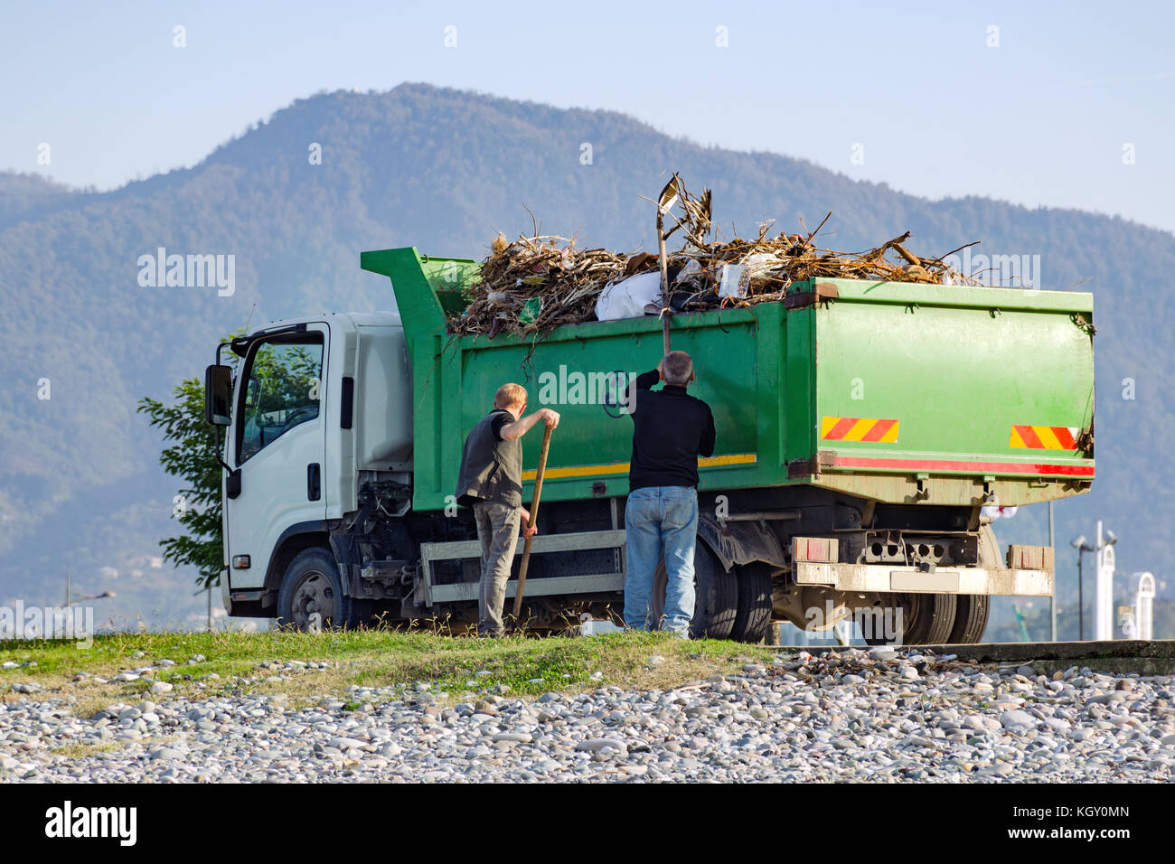Garbage collecting hi-res stock photography and images - Alamy
