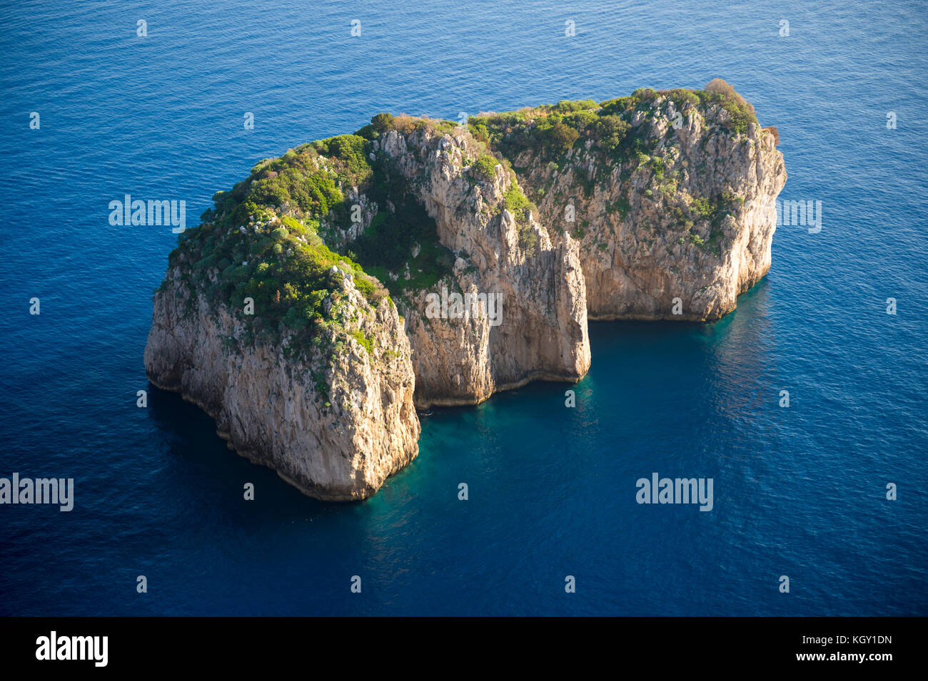 View of iconic faraglioni rocks and cliffs of Capri Island in Italy ...