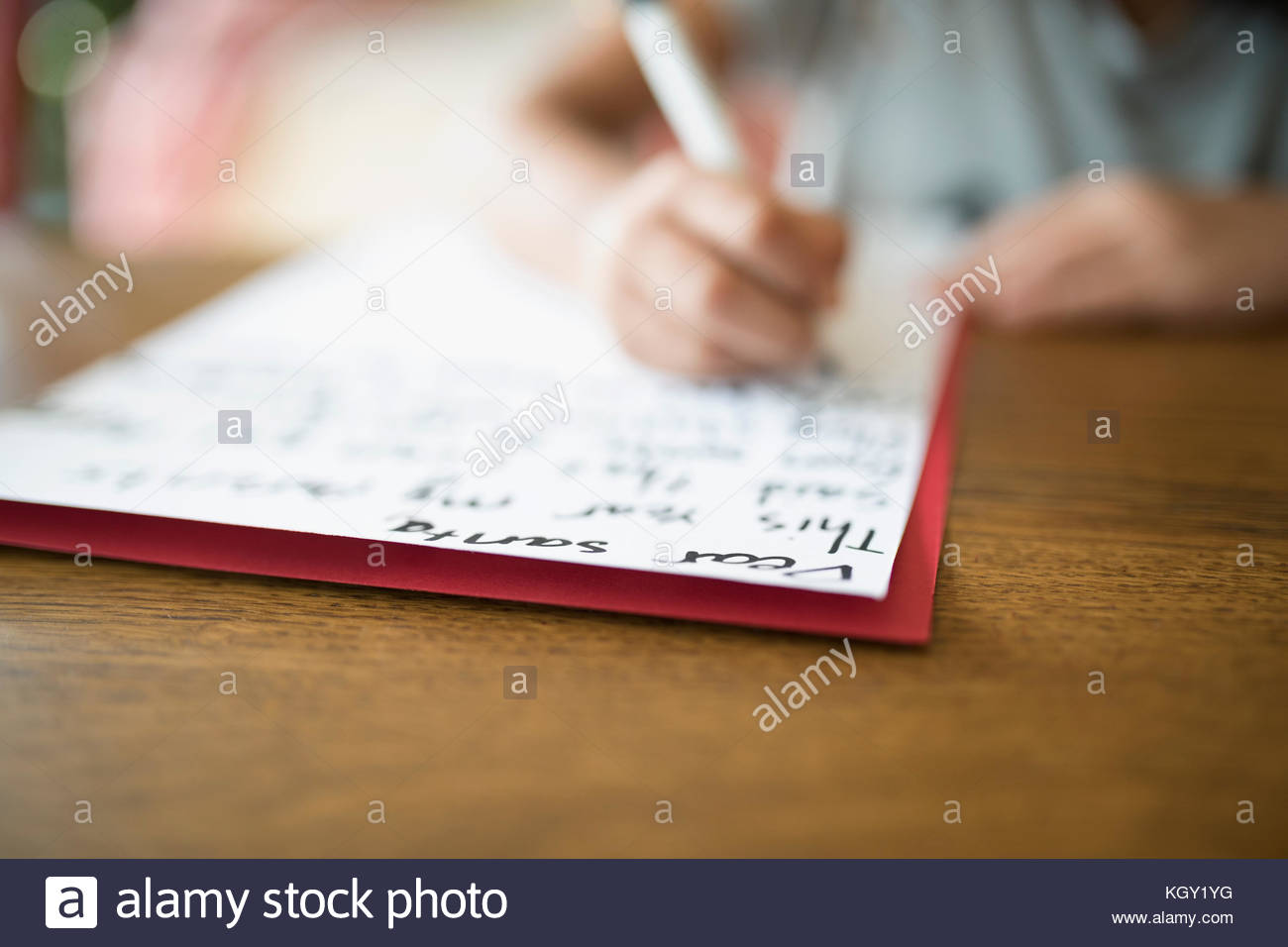 Close up girl writing Christmas letter to Santa Stock Photo - Alamy
