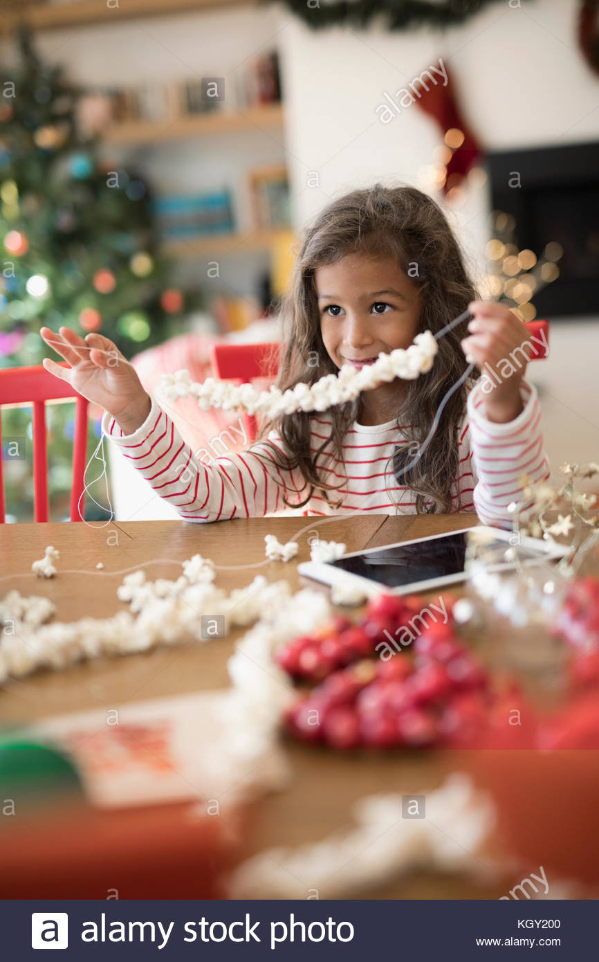Stringing popcorn hi-res stock photography and images - Alamy