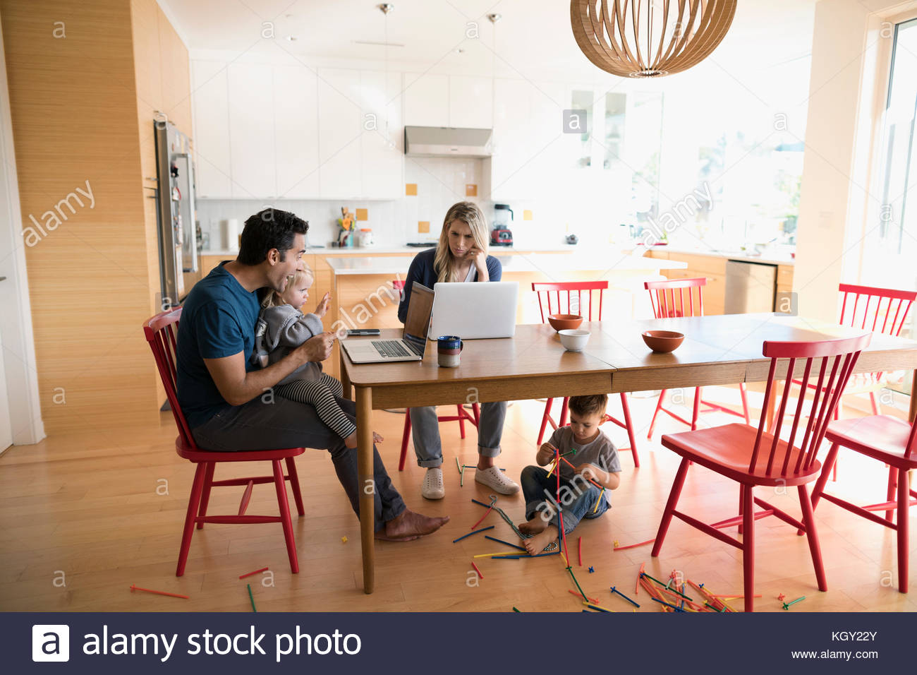 Children playing at a table hi-res stock photography and images - Alamy