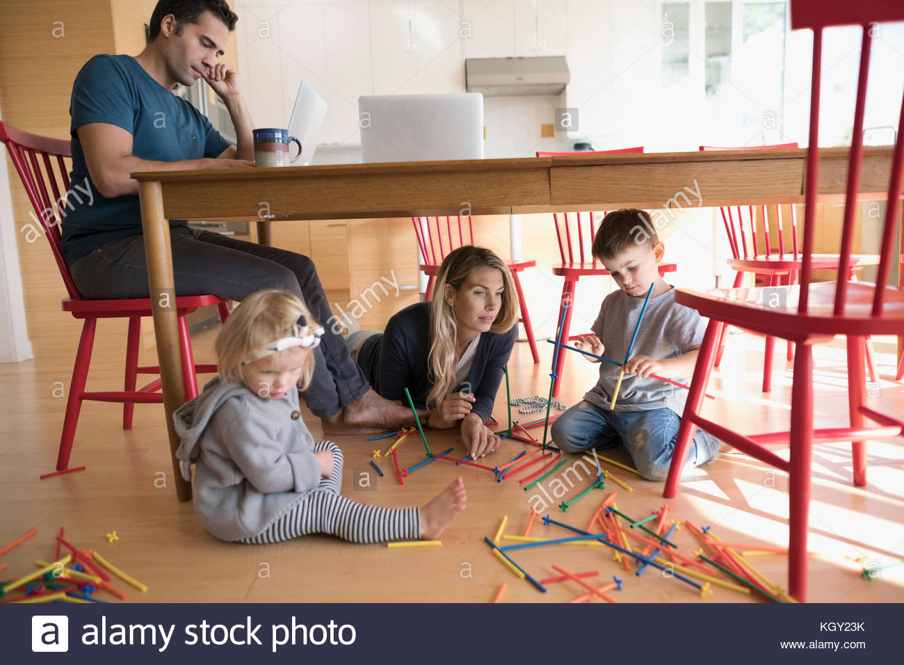 Parents working with children High Resolution Stock Photography and ...
