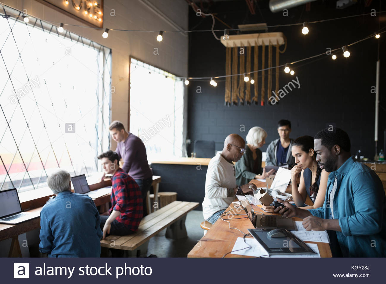 Designers and computer programmers group think brainstorming in office ...