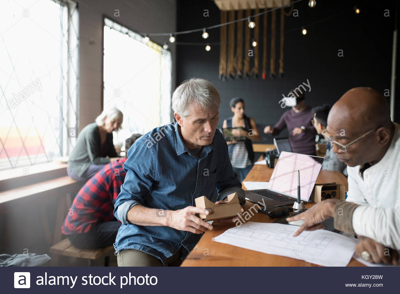 Senior engineer in meeting hi-res stock photography and images - Alamy