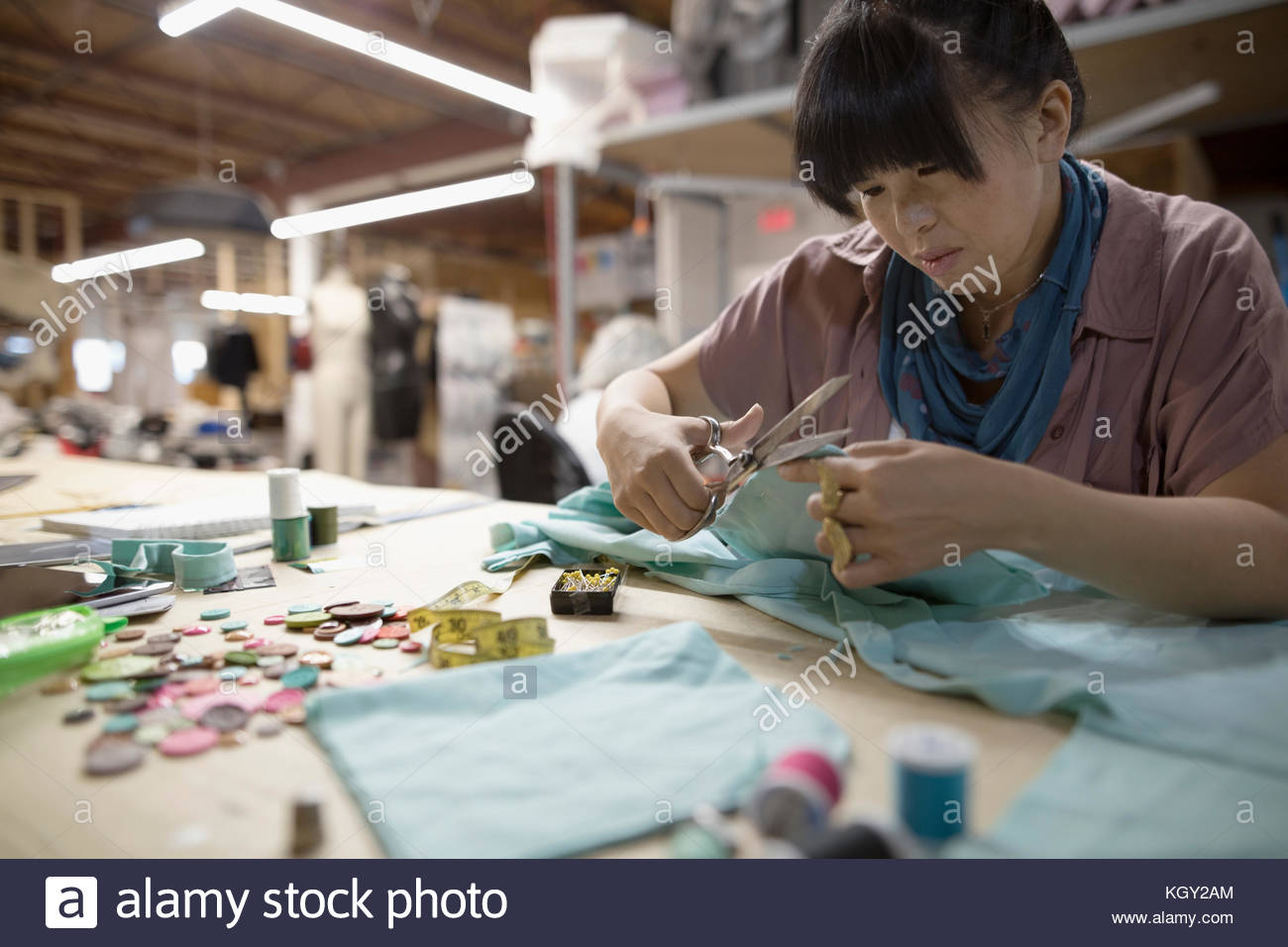 Black fabric cutting hi-res stock photography and images - Alamy