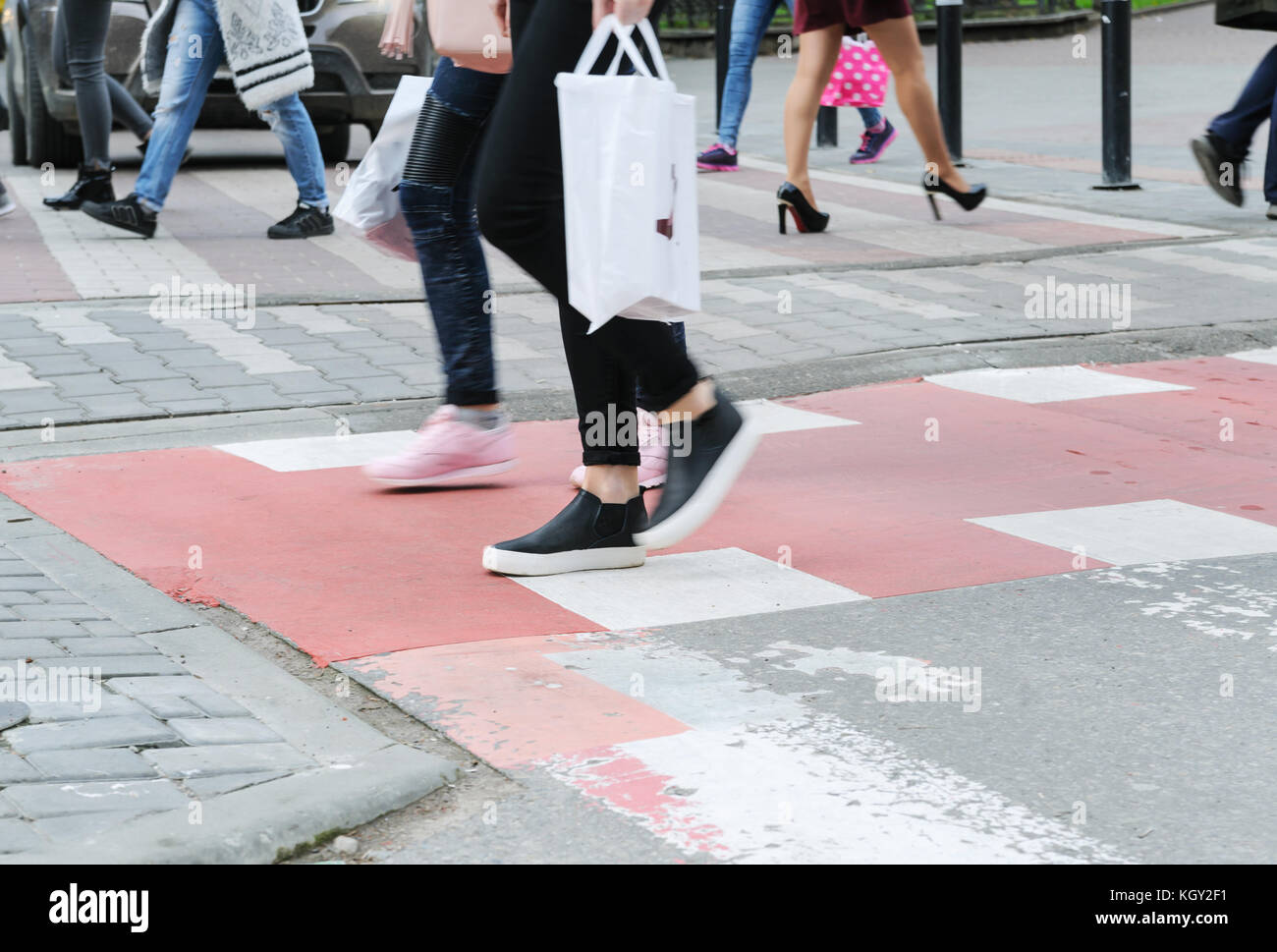 Human legs are moving on a pedestrian crossing Stock Photo - Alamy