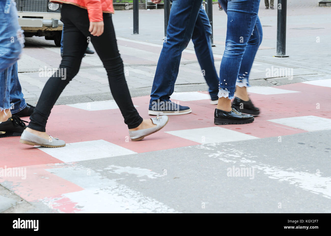 Human legs are moving on a pedestrian crossing Stock Photo - Alamy