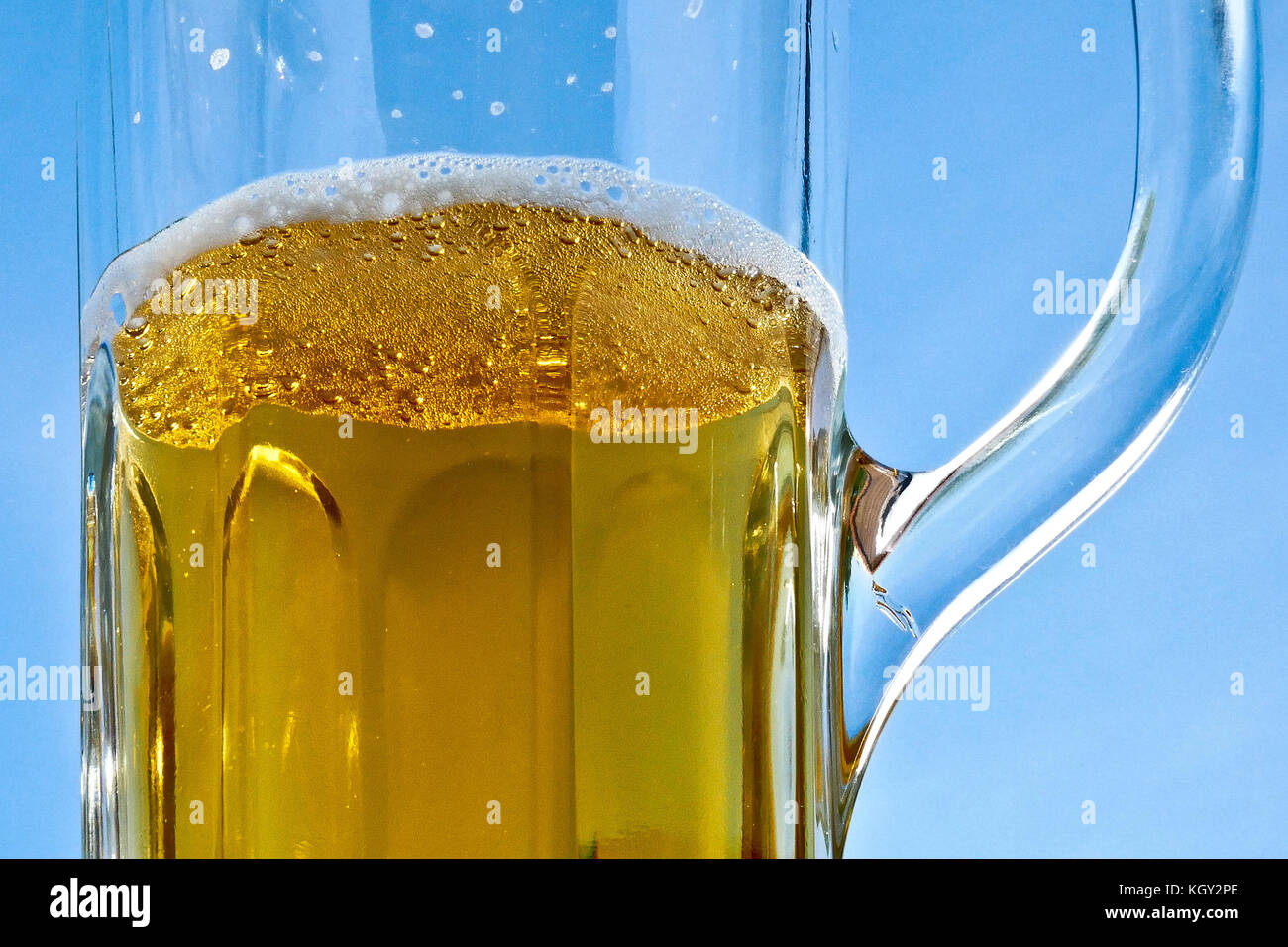 Detail of Beer Glass on the Blue Background. Bottom View Stock Photo ...