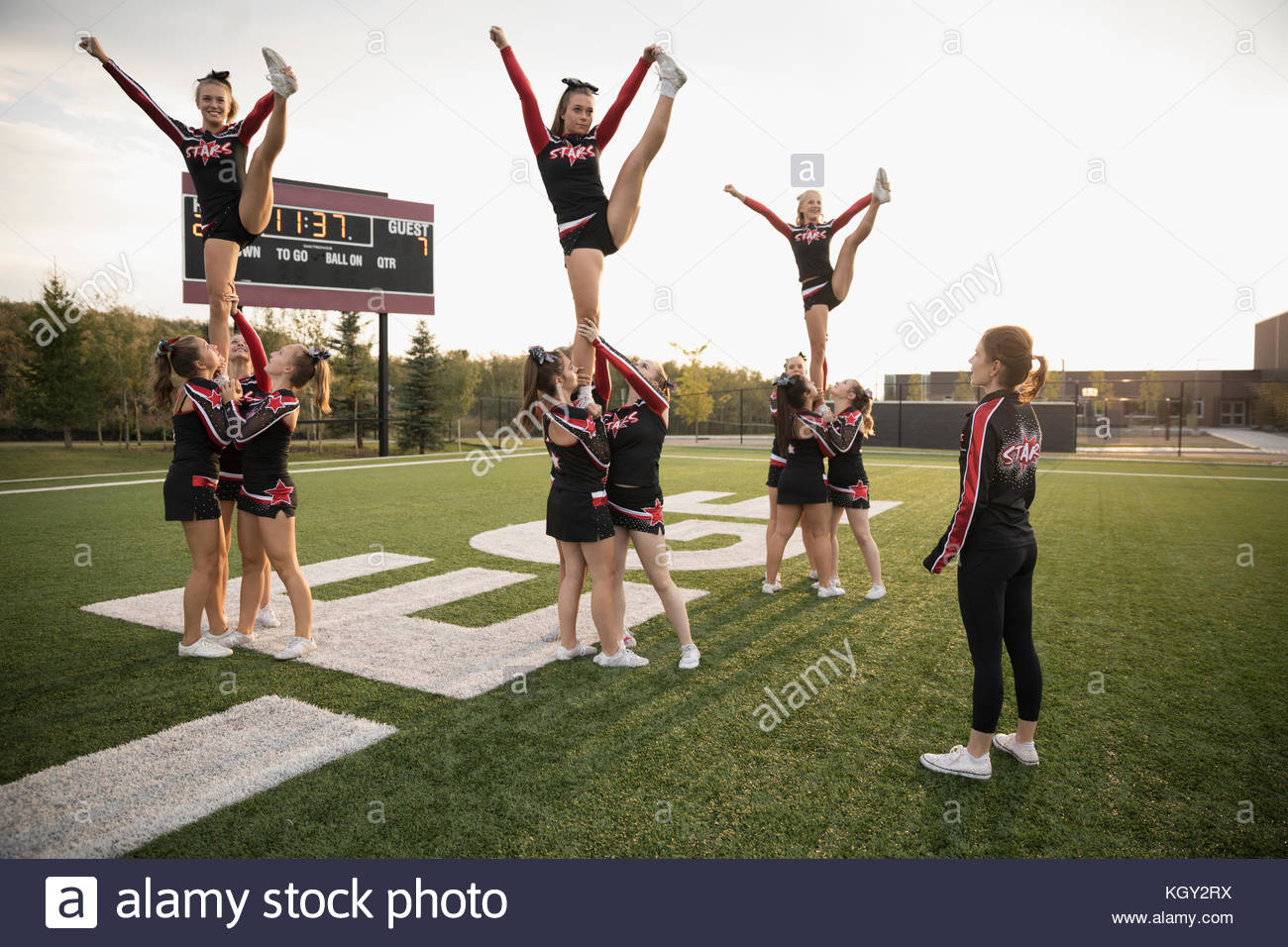 High school cheerleader watching game hi-res stock photography and ...