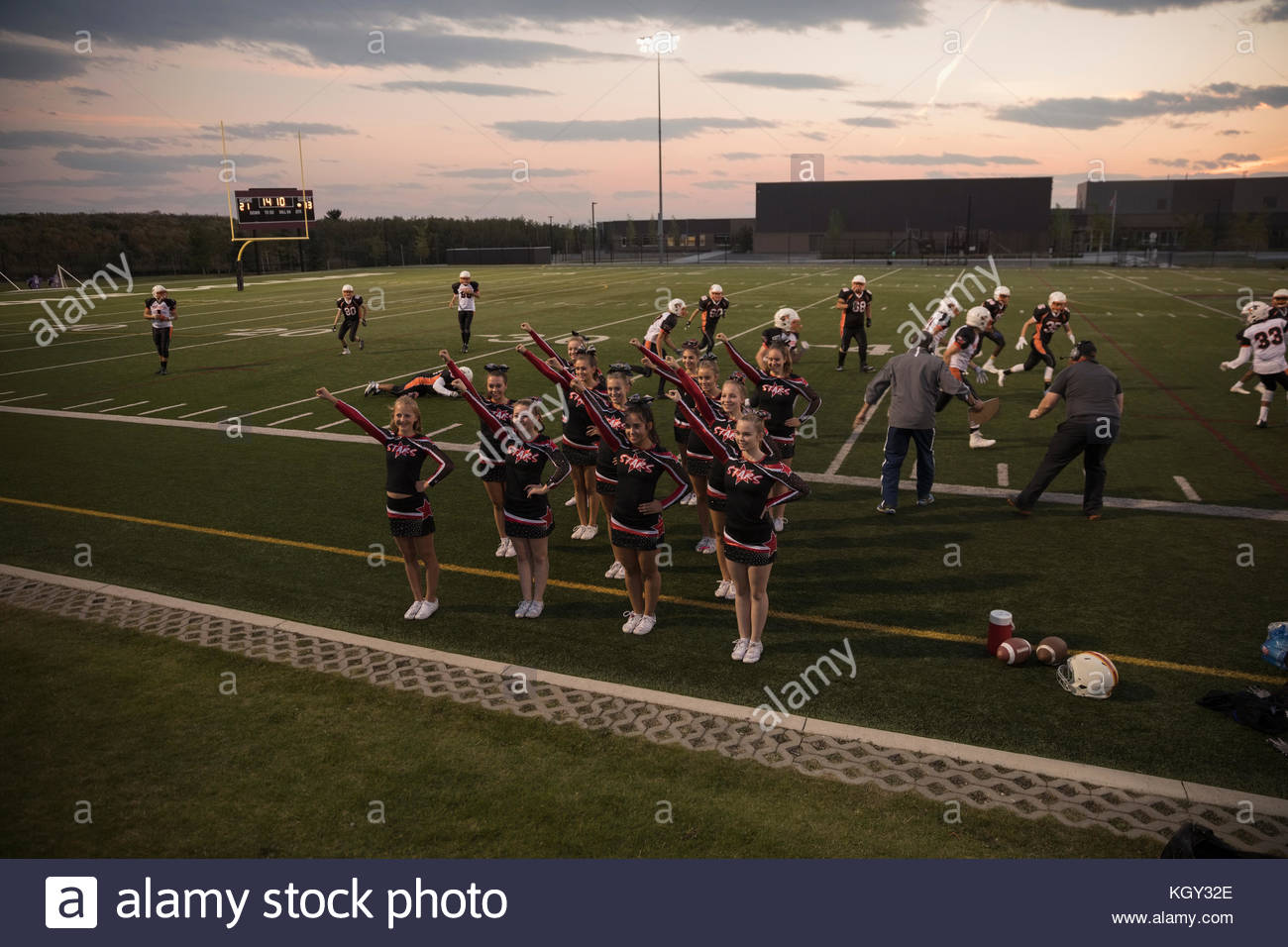 Young cheerleader man jumping hi-res stock photography and images - Alamy