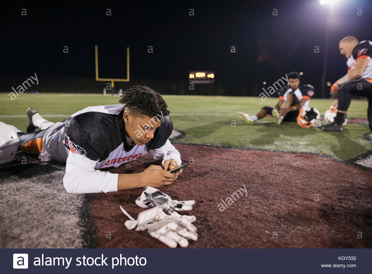 Student texting uniform hi-res stock photography and images - Alamy