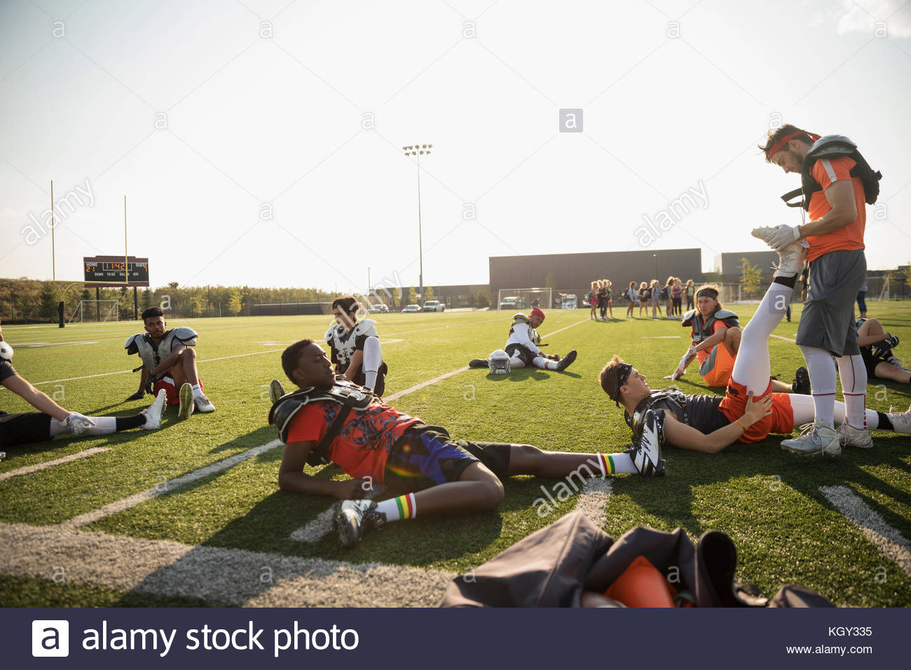 Stretching football hi-res stock photography and images - Alamy