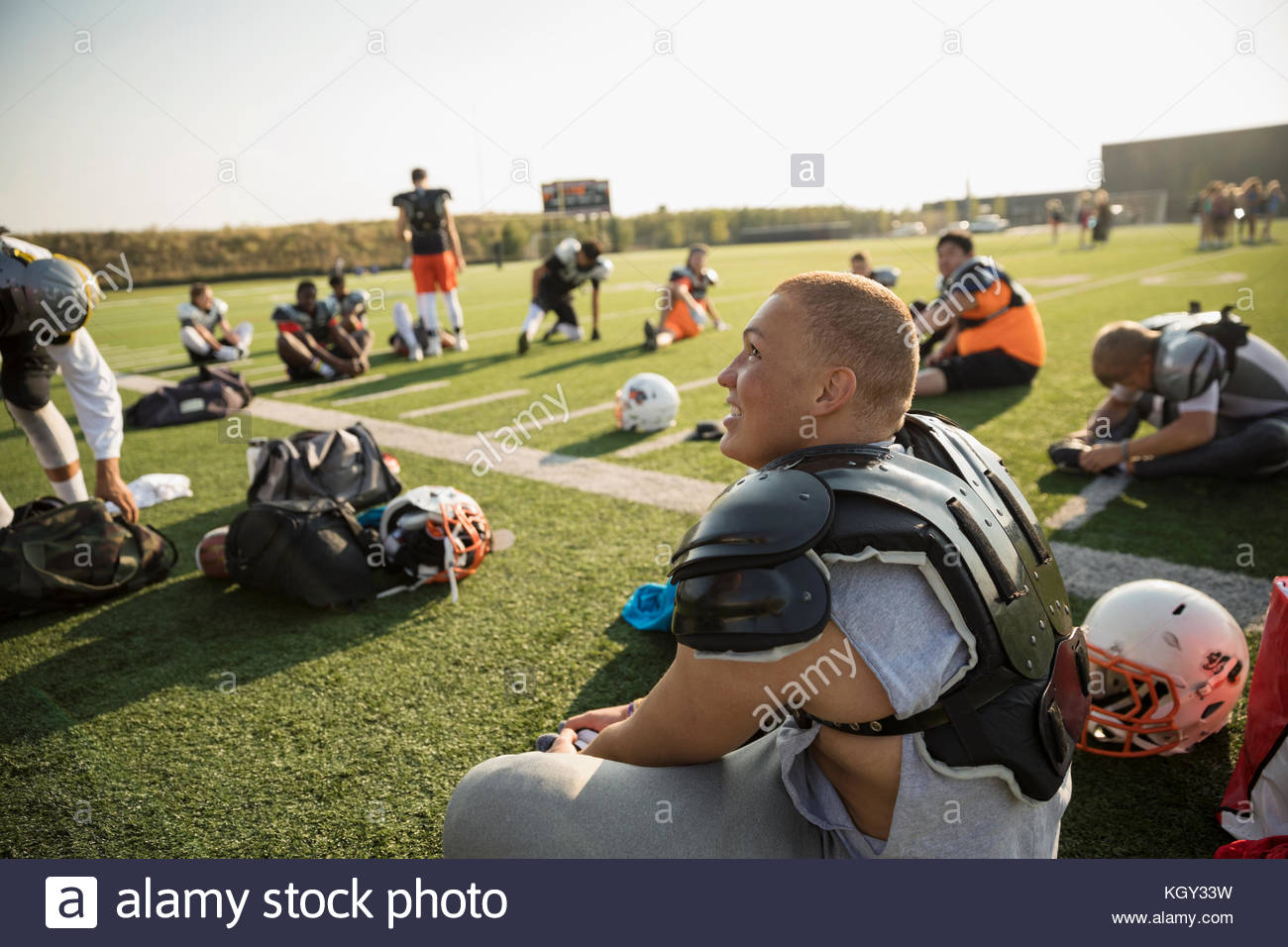 Football sitting hi-res stock photography and images - Alamy