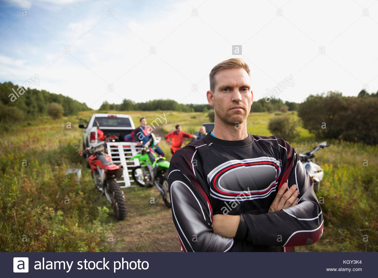 Serious man standing outdoors hi-res stock photography and images - Alamy