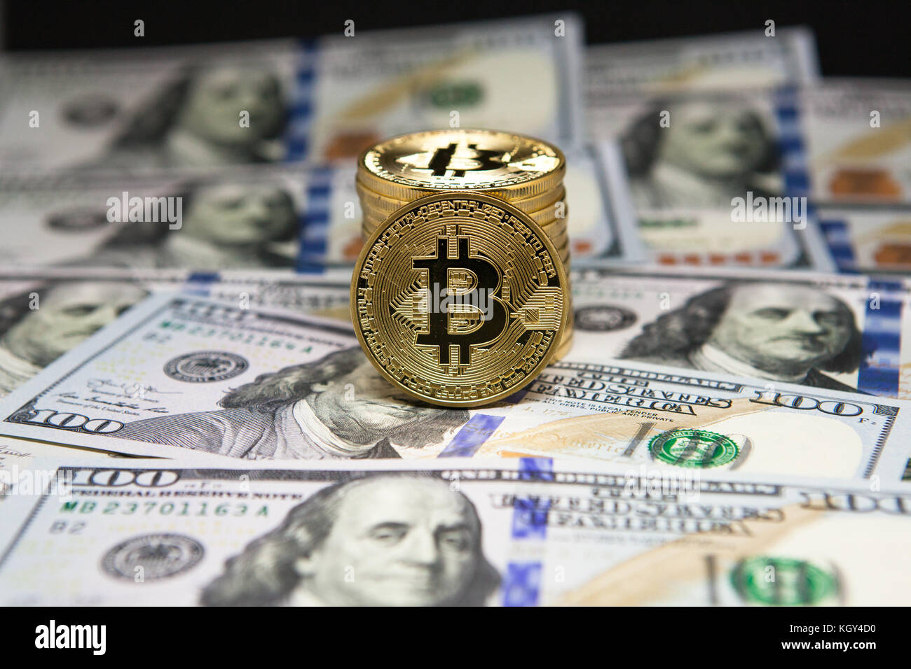 $100 bills and Bitcoin Stock Photo - Alamy