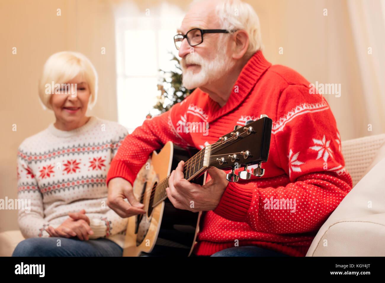senior man playing on guitar Stock Photo - Alamy