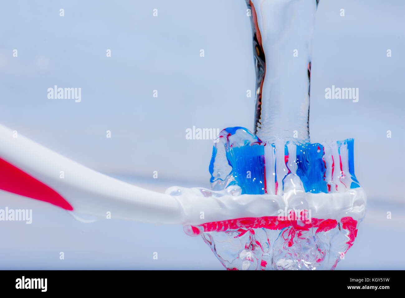 Colorful tooth brush under water Stock Photo - Alamy