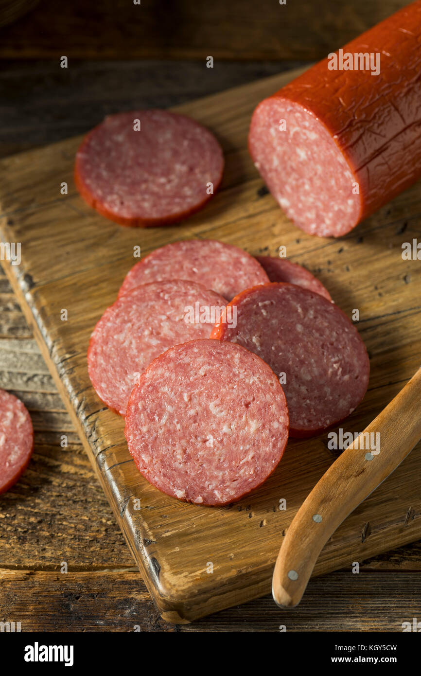 Spiced Savory Hard Salami Cut into Slices Stock Photo - Alamy