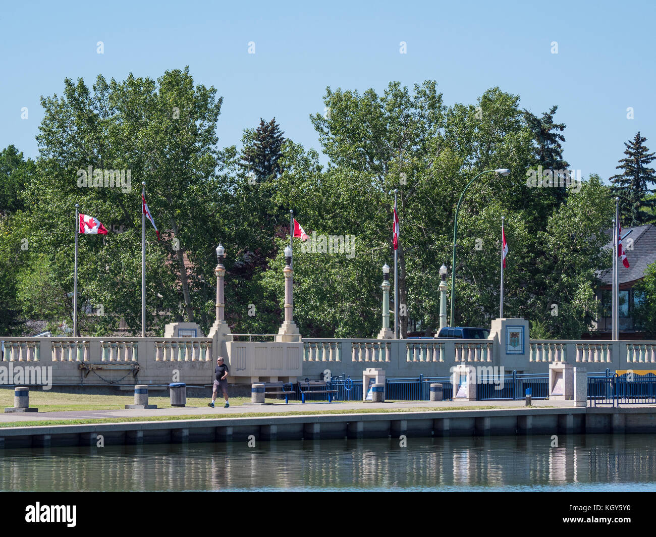Bridge, dam and flags, Wascana Lake, Regina, Saskatchewan, Canada Stock ...