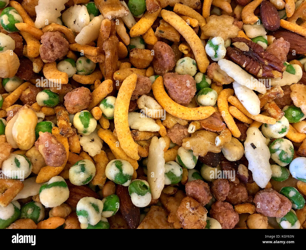 Happy hour trail mix snack food background Stock Photo - Alamy