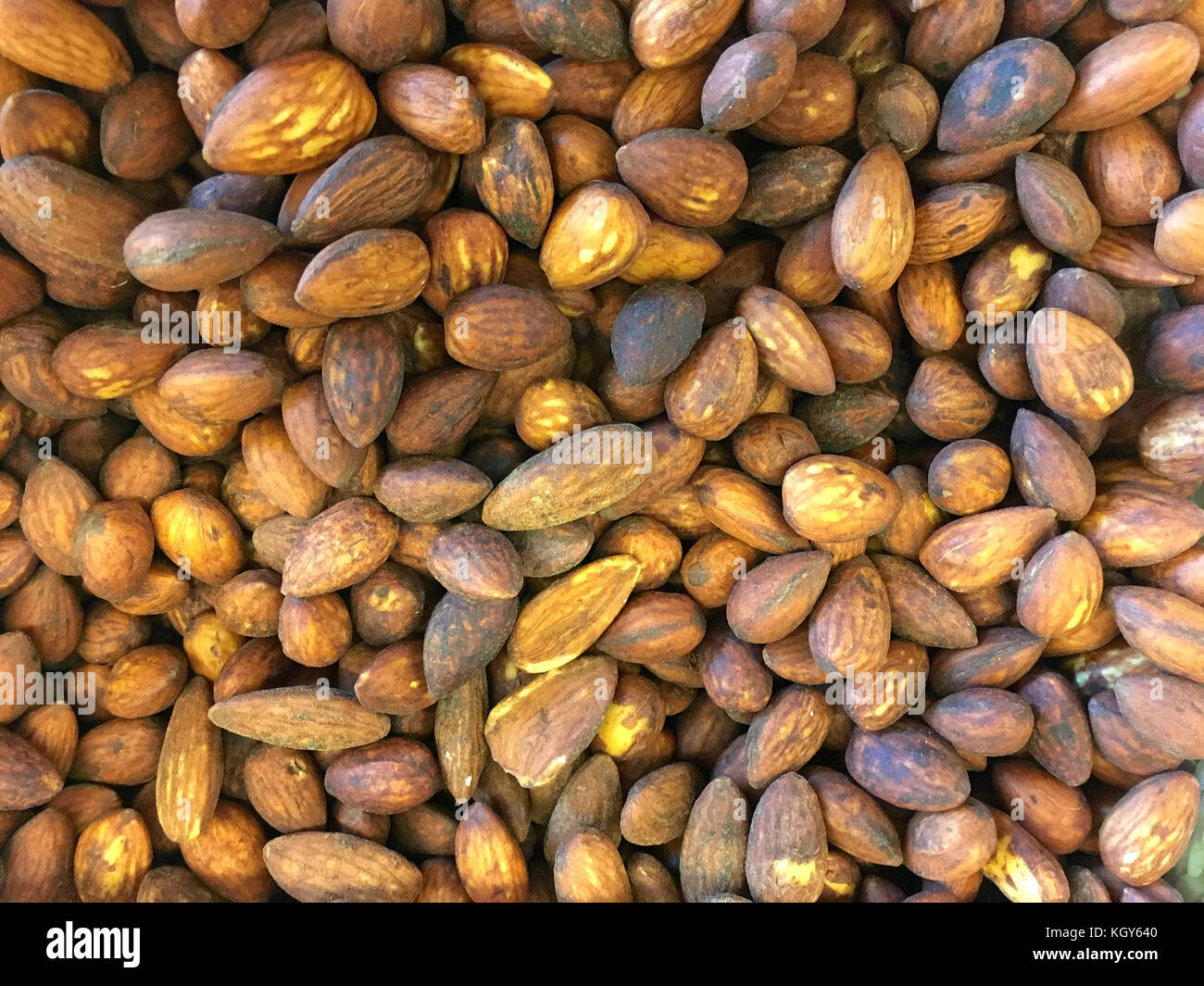 Tamari Almonds background Stock Photo - Alamy