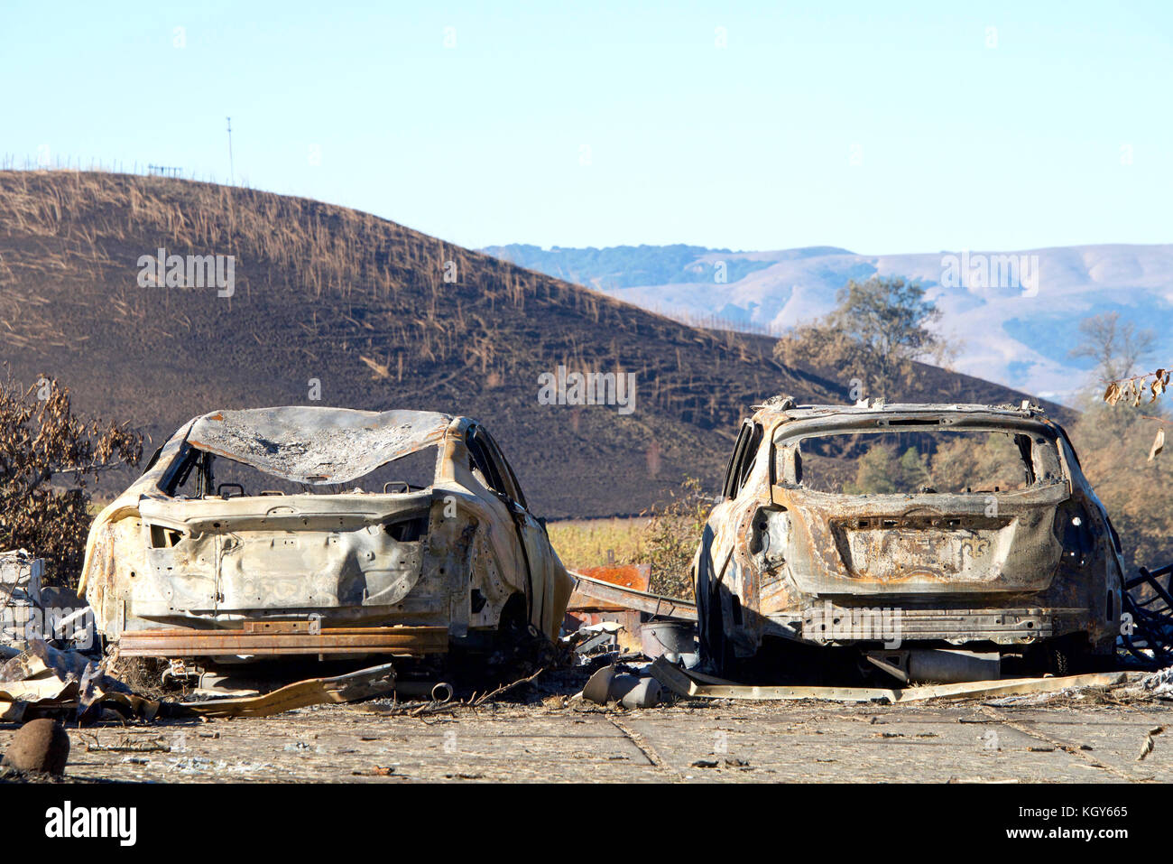 Two cars parked off the road, burned in the North Bay firestorm ...