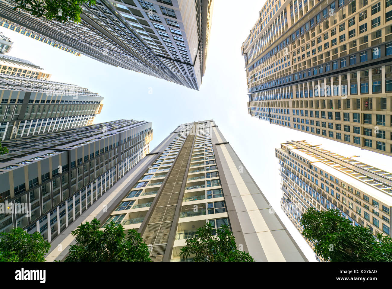 Skyscrapers viewed from below towards sky represents urban development ...