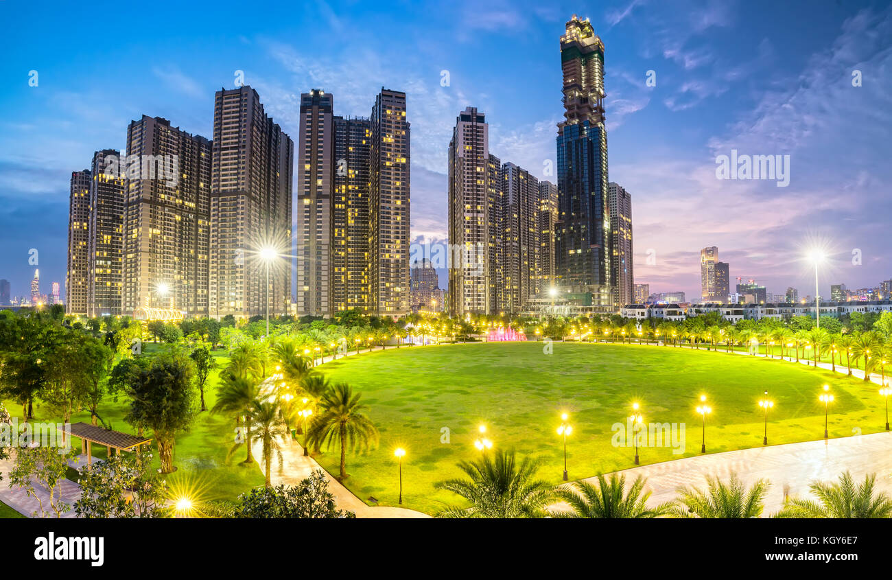 Panoramic view of skyscrapers at night with many sparkling lights ...