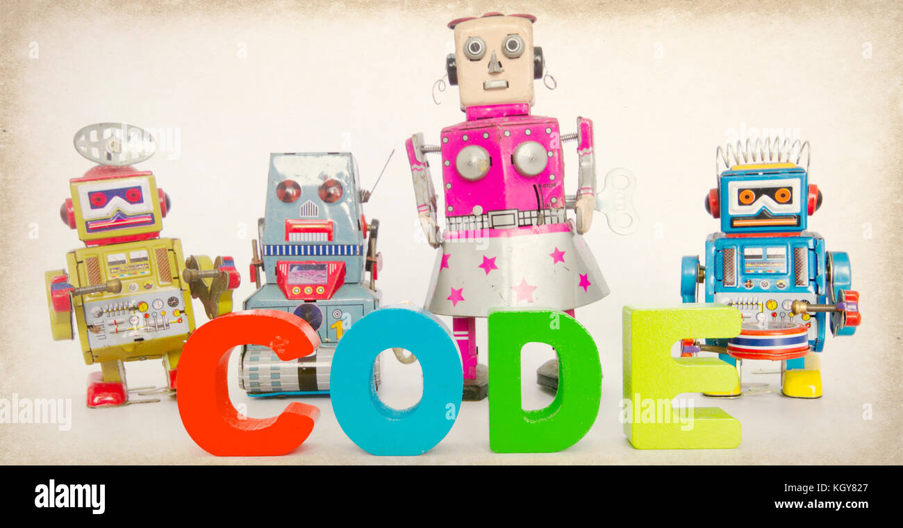 robots and the word CODE Stock Photo - Alamy
