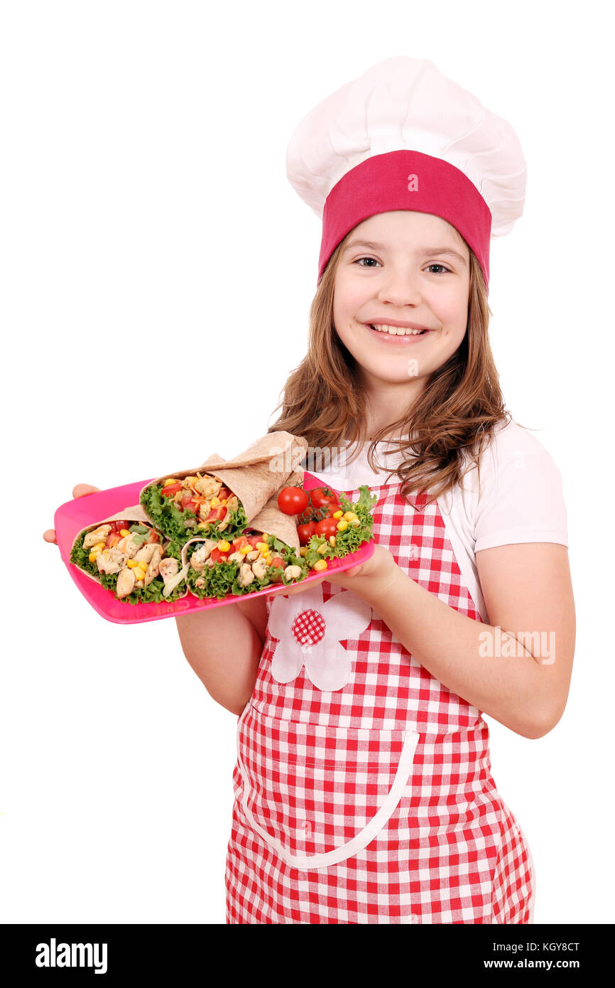 happy little girl cook with burritos on plate Stock Photo - Alamy