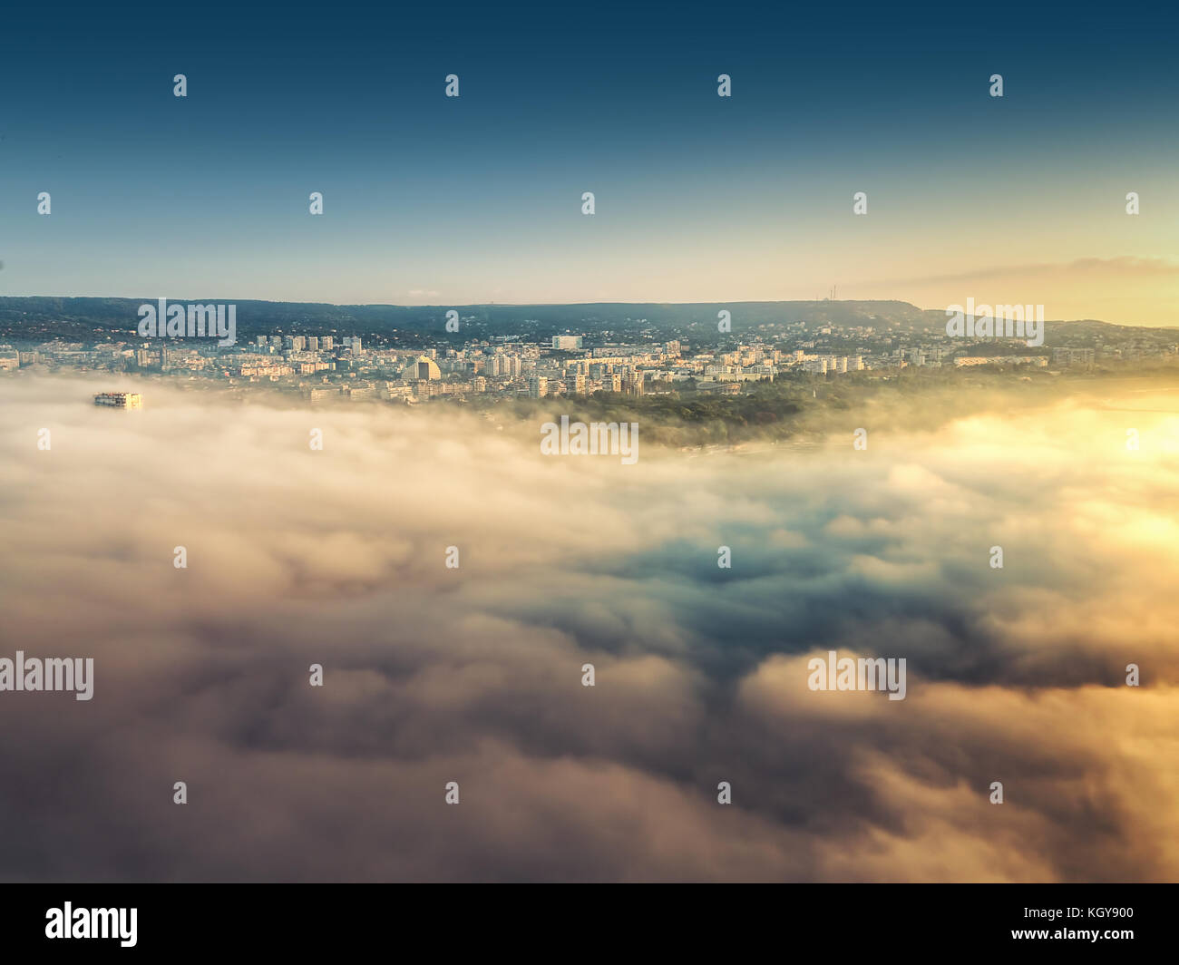 Flying above the clouds at sunrise Stock Photo - Alamy