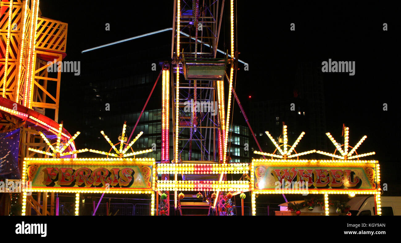 ferris wheel neon lights at fariground Stock Photo - Alamy
