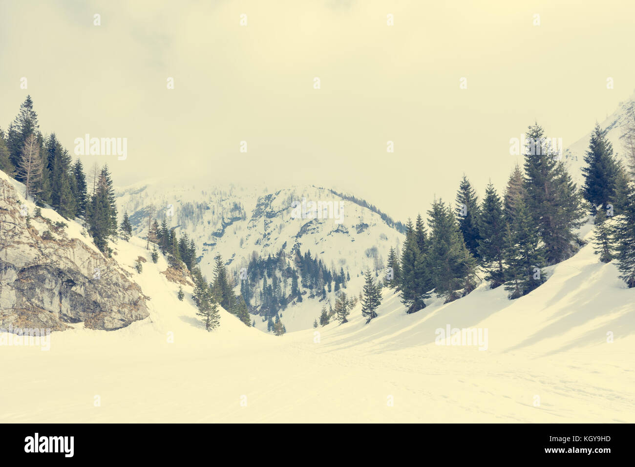 Snow covered mountain valley Stock Photo - Alamy