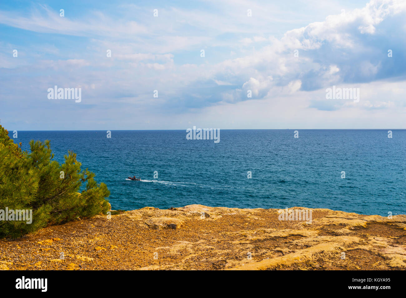 high cliff above the sea, summer sea background, many splashing waves ...