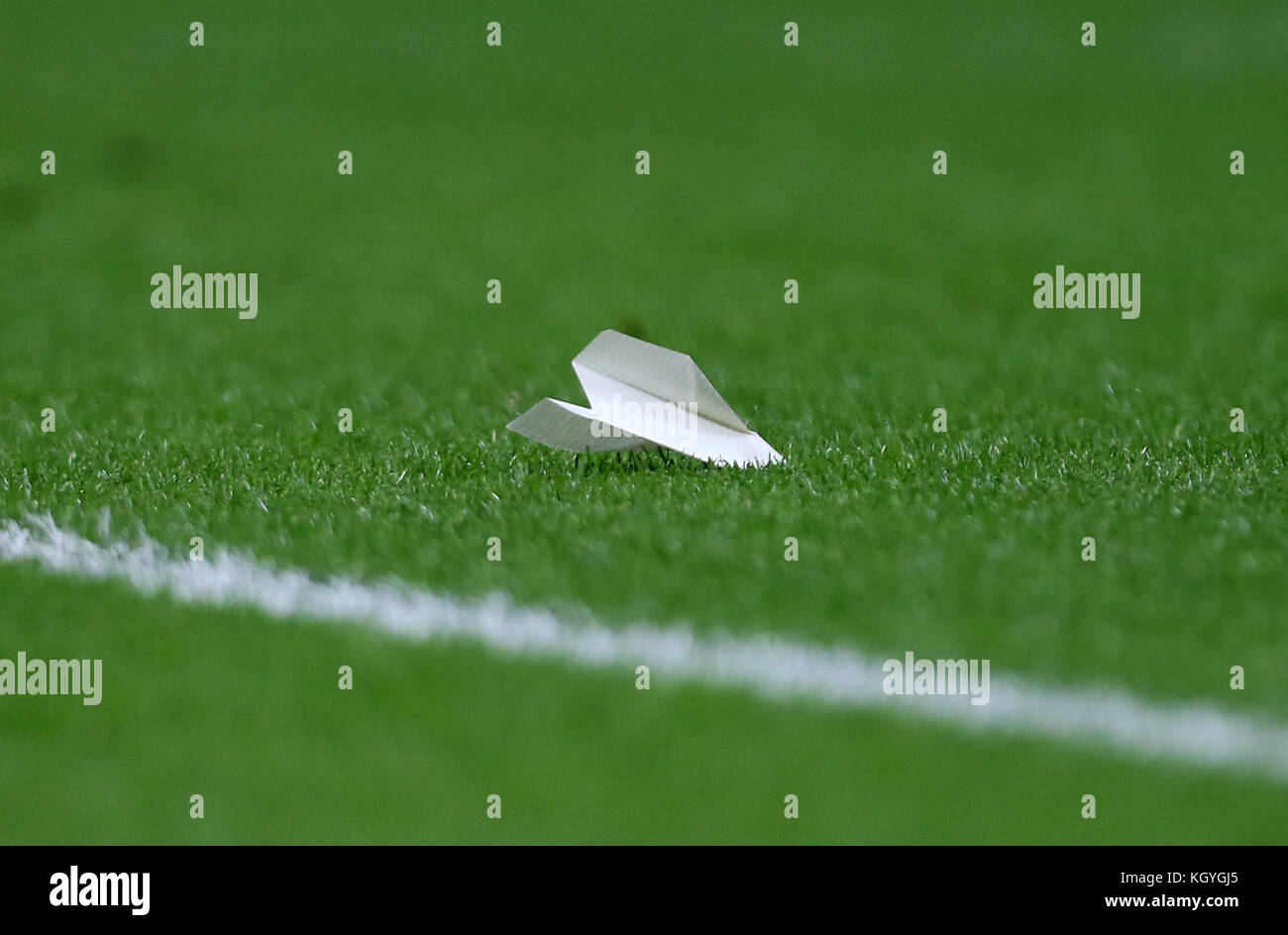 London, UK. 10th Nov, 2017. Paper airplanes thrown onto the pitch ...