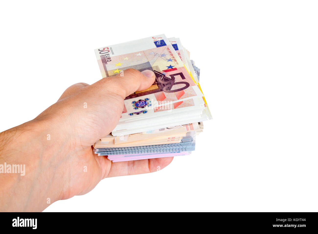 Stack of euro banknotes holding by man hand, focused on saving money in ...